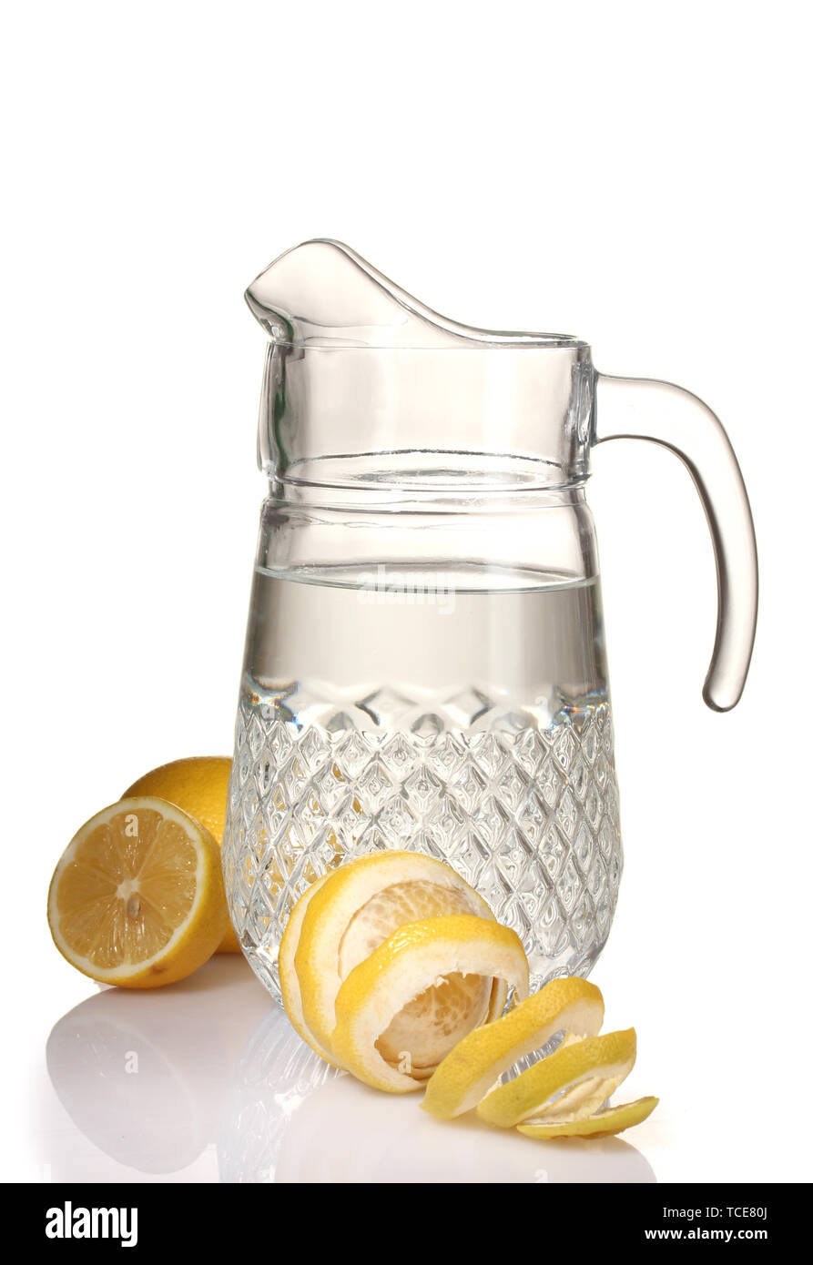 pitcher of lemonade and lemon isolated on white Stock Photo - Alamy
