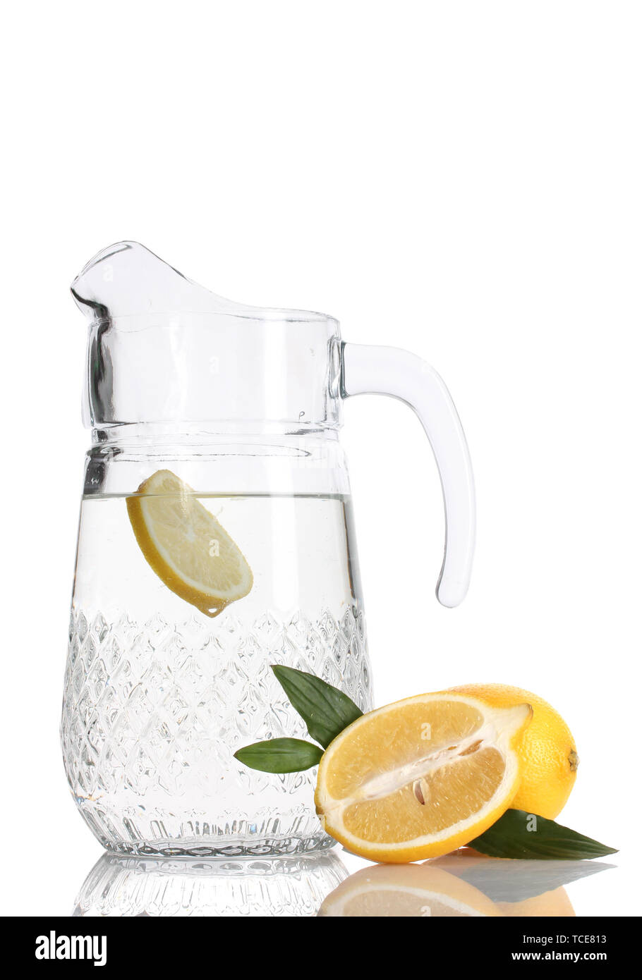 pitcher of lemonade and lemon isolated on white Stock Photo - Alamy