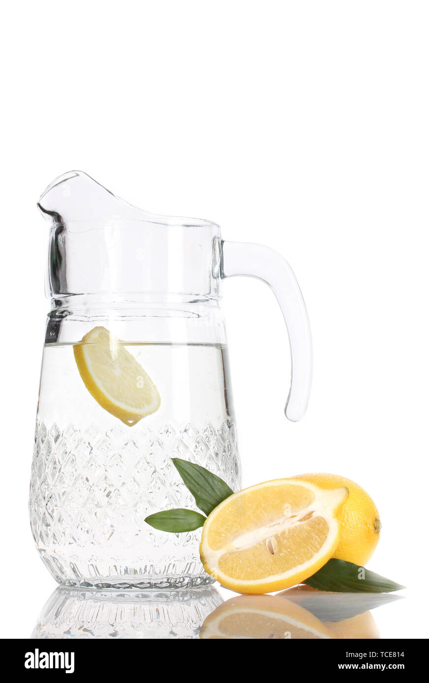 pitcher of lemonade and lemon isolated on white Stock Photo - Alamy