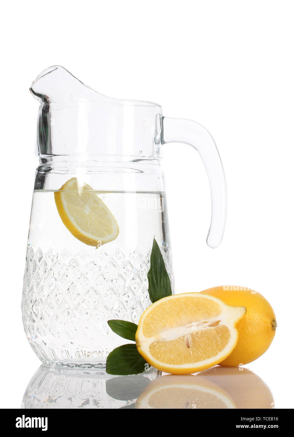 pitcher of lemonade and lemon isolated on white Stock Photo - Alamy