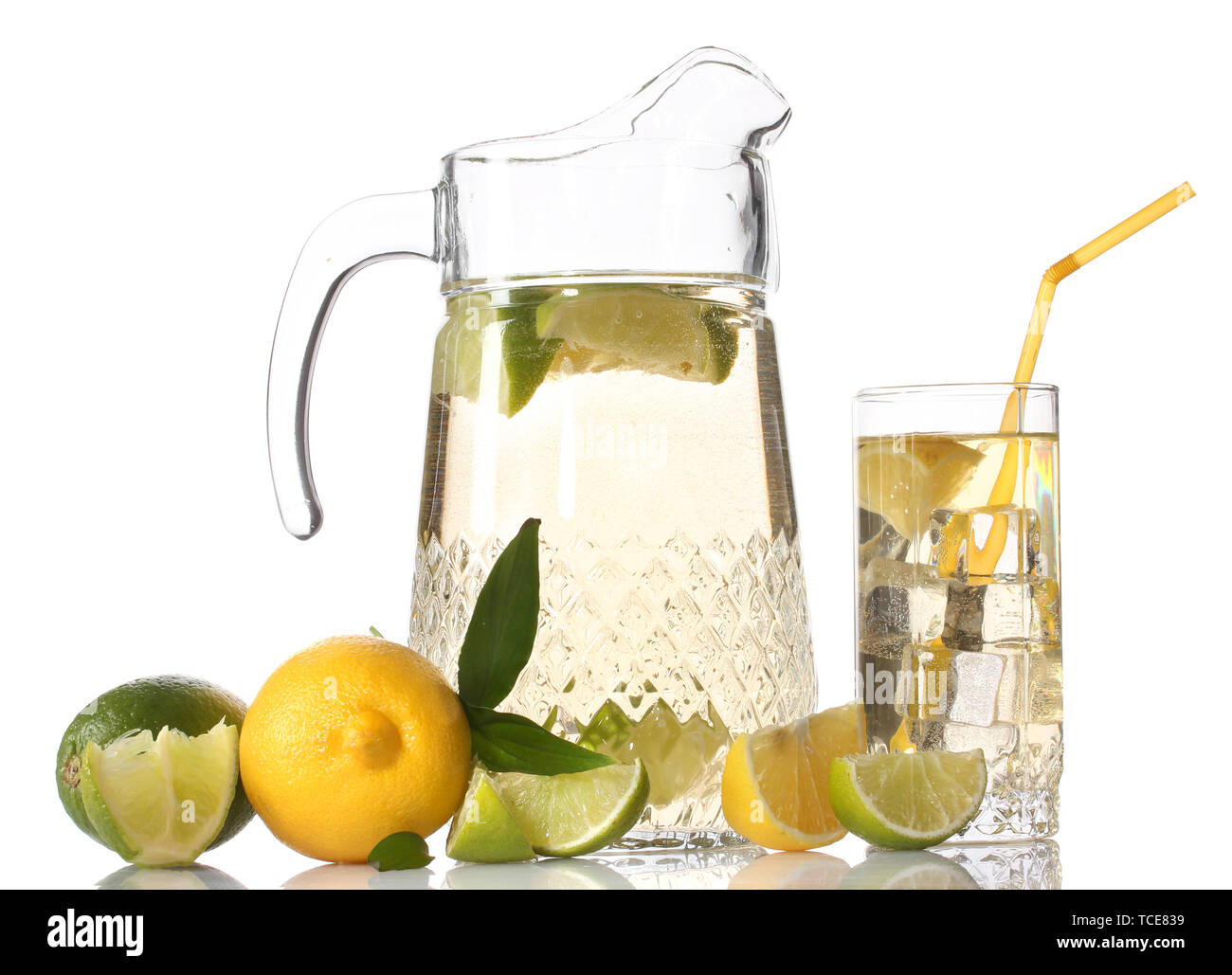 pitcher and glass of lemonade and lemon isolated on white Stock Photo ...