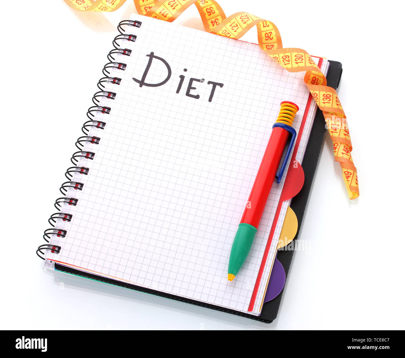 Planning of diet. Notebook measuring tape and pencil isolated on white ...