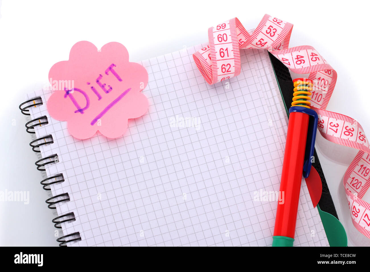 Planning of diet. Notebook measuring tape and pencil isolated on white ...