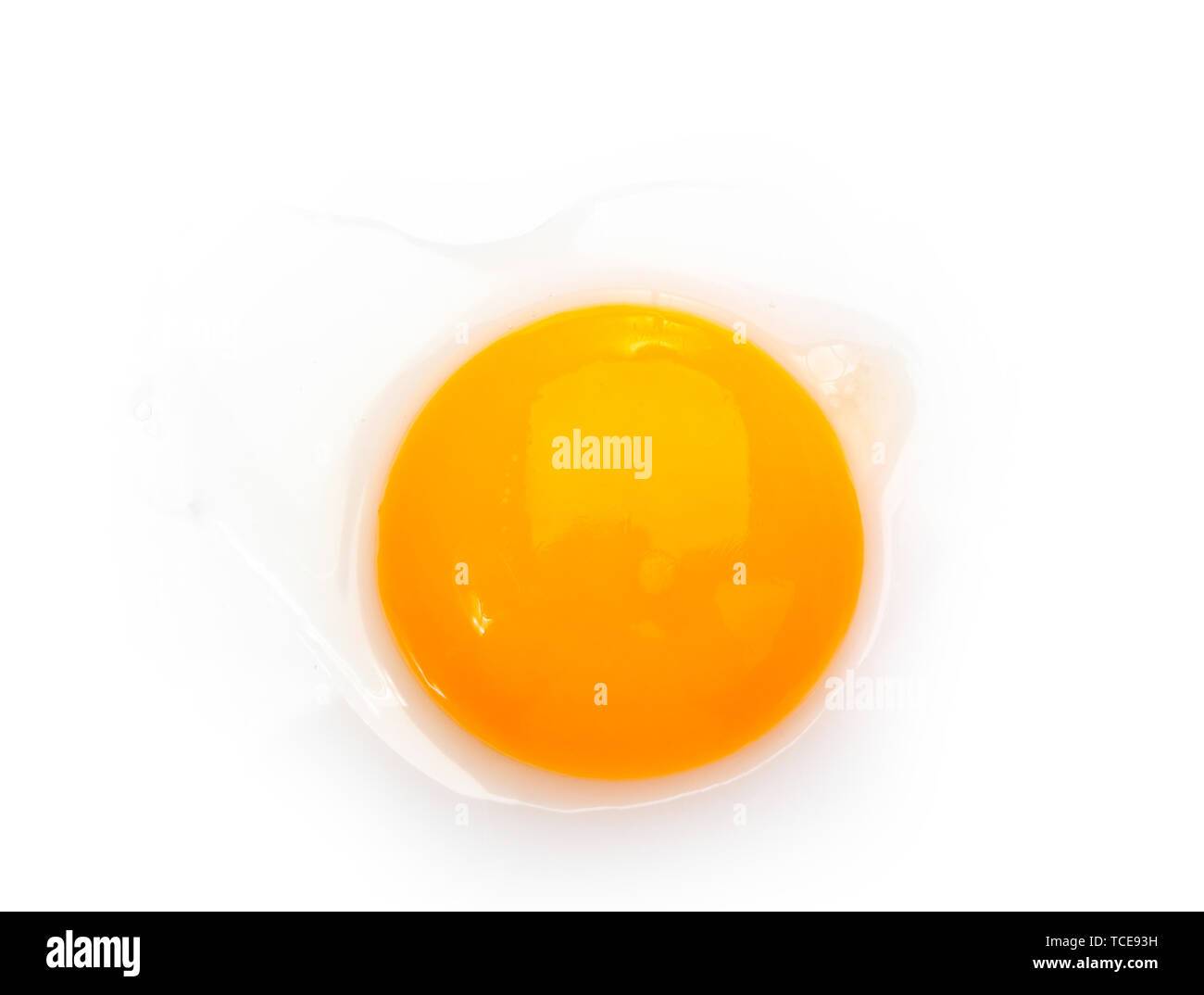 Egg yolk closeup isolated on white Stock Photo - Alamy