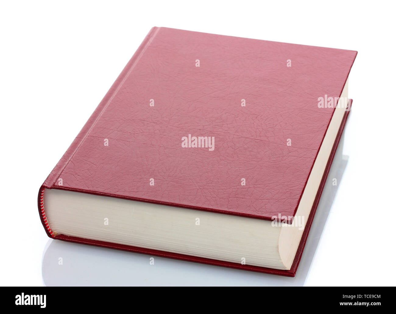 Big red book isolated on white Stock Photo - Alamy