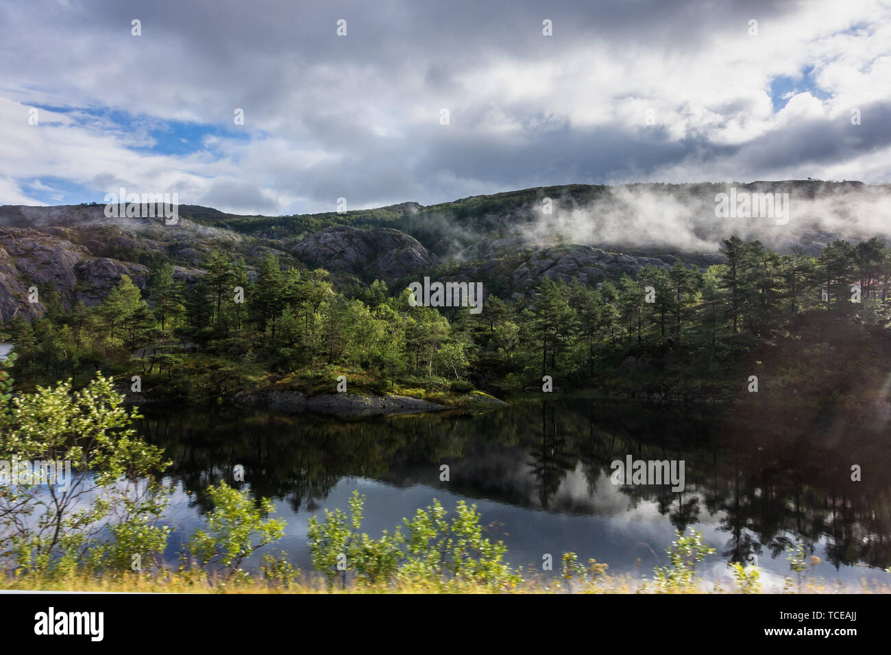 Scenic lake and natural landscape along a road in Hordaland county near ...