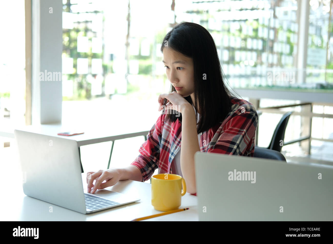 girl teenager college high school student studying with computer laptop ...