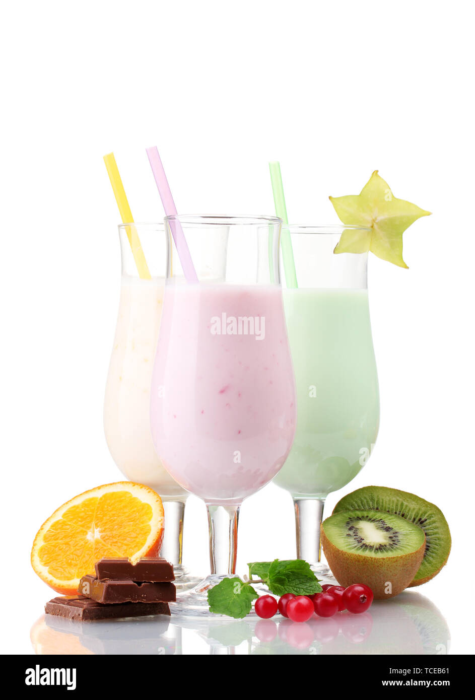 Milk shakes with fruits isolated on white Stock Photo - Alamy