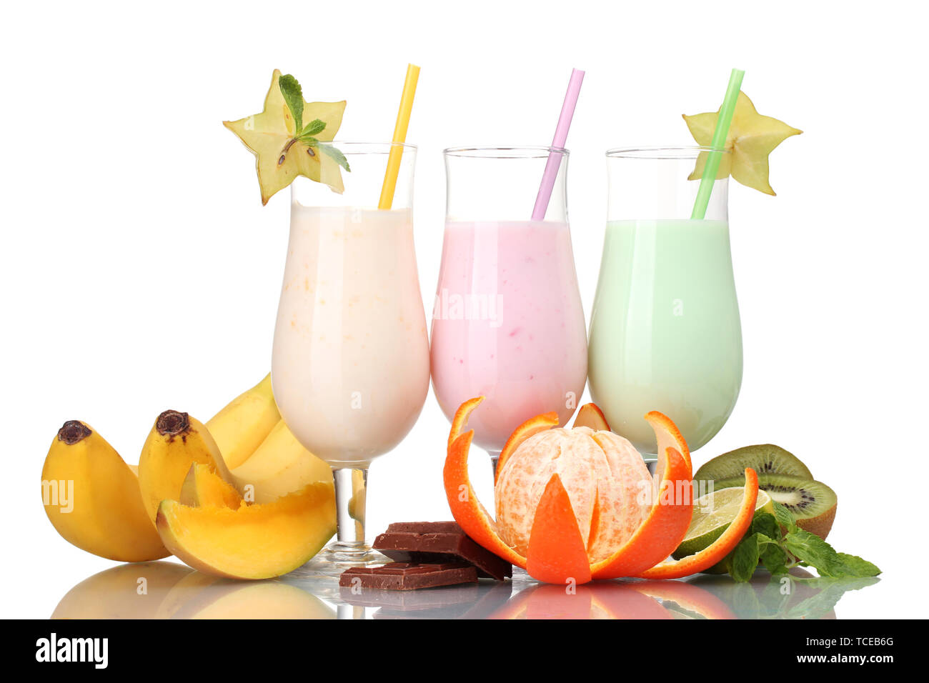 Milk shakes with fruits isolated on white Stock Photo - Alamy