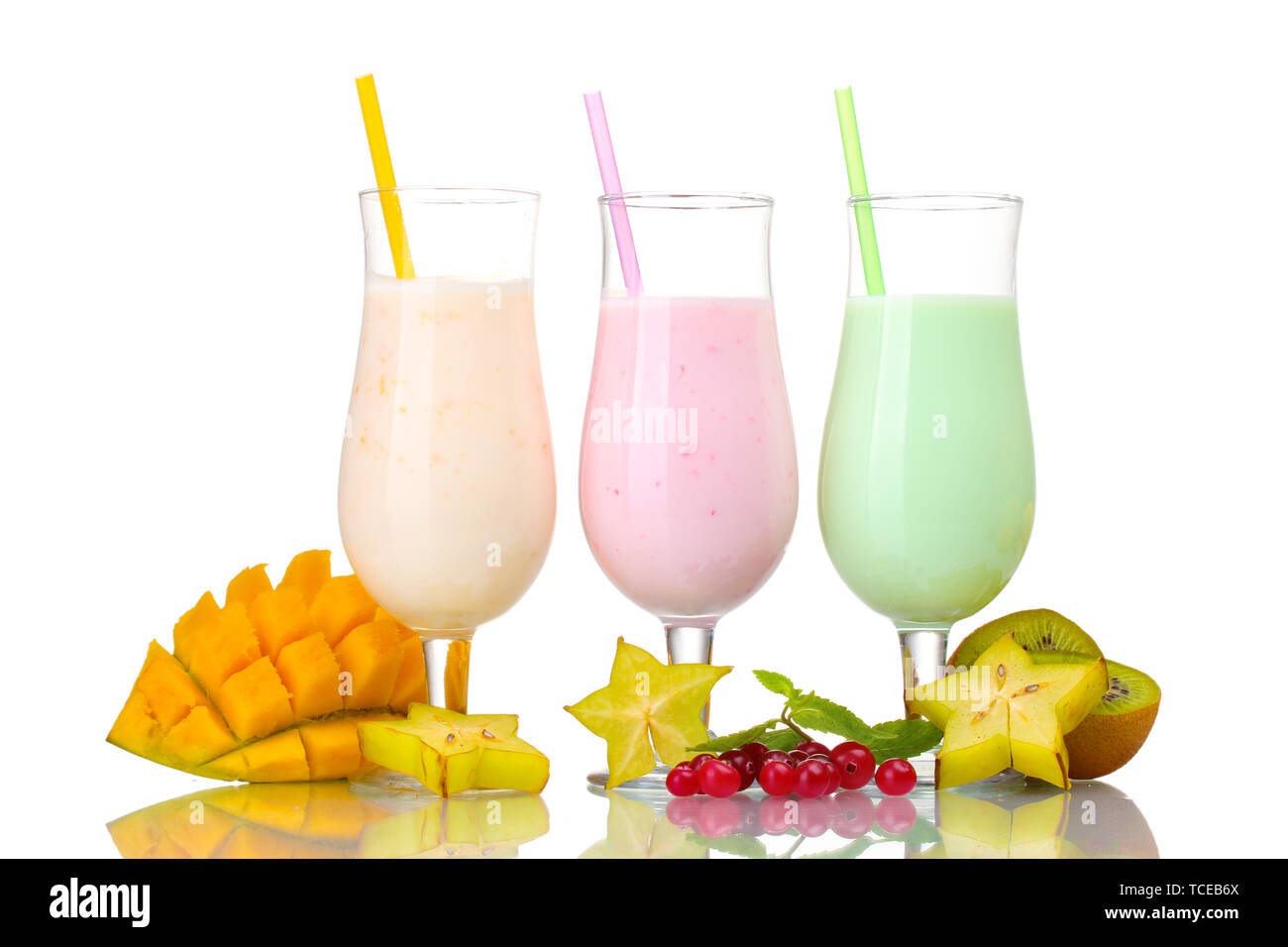 Milk shakes with fruits isolated on white Stock Photo - Alamy
