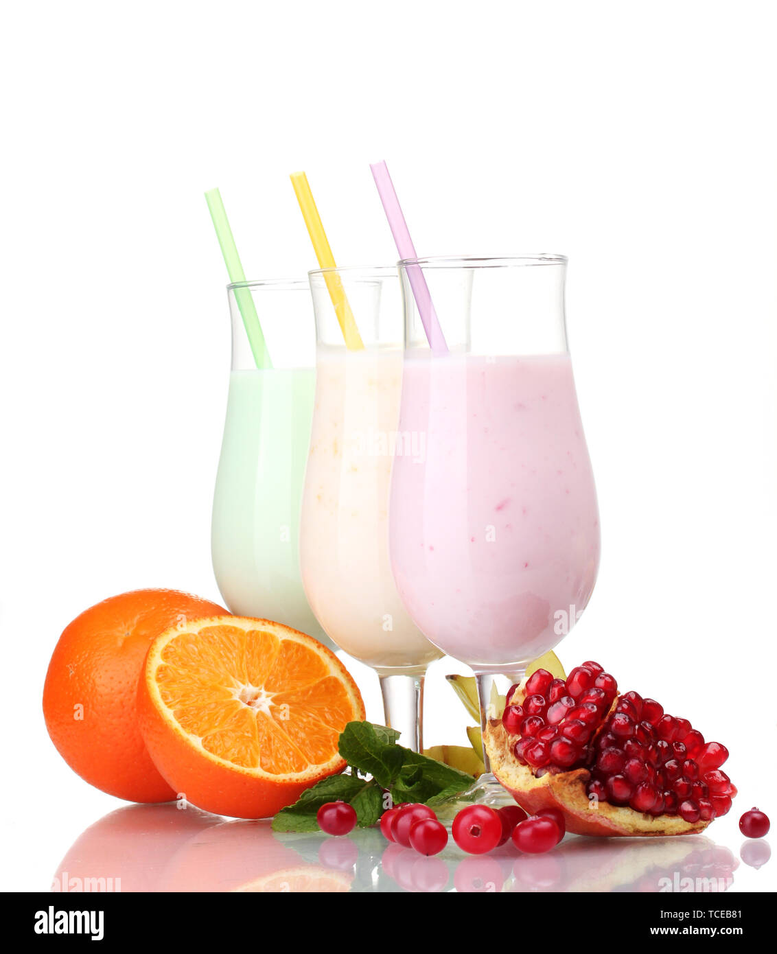 Milk shakes with fruits isolated on white Stock Photo - Alamy