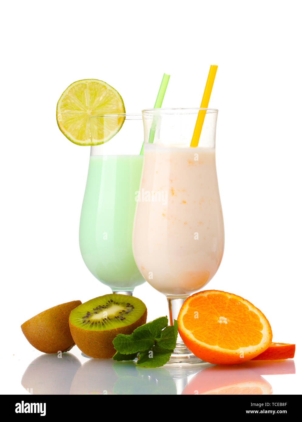 Milk shakes with fruits isolated on white Stock Photo - Alamy