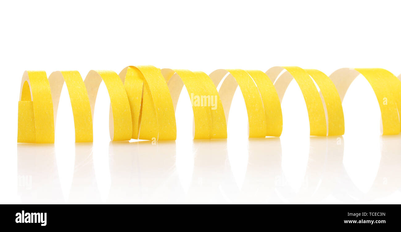 Yellow serpentine streamer isolated hi-res stock photography and images ...