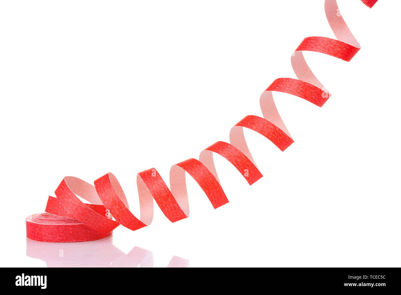 red streamer isolated on white Stock Photo - Alamy