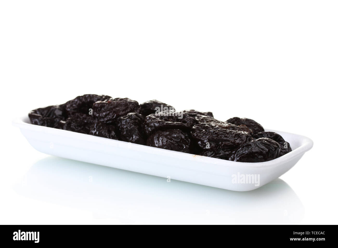 yummy dried plums in packaging isolated on white Stock Photo - Alamy