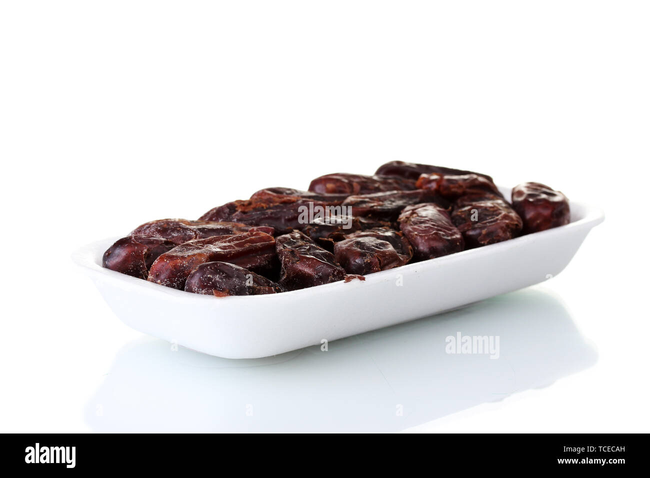 delicious dried dates in packaging isolated on white Stock Photo - Alamy