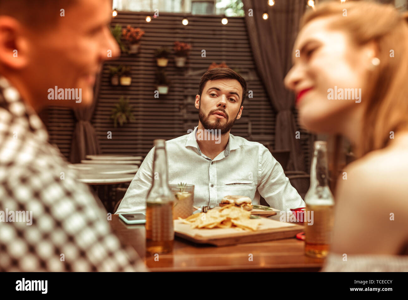 Man woman jealous smiling hi-res stock photography and images - Alamy