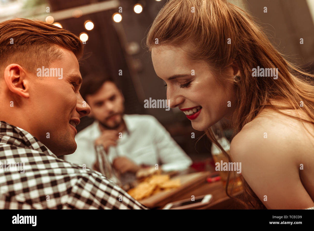 Flirting couple. Close-up face portrait of beautiful attractive young ...