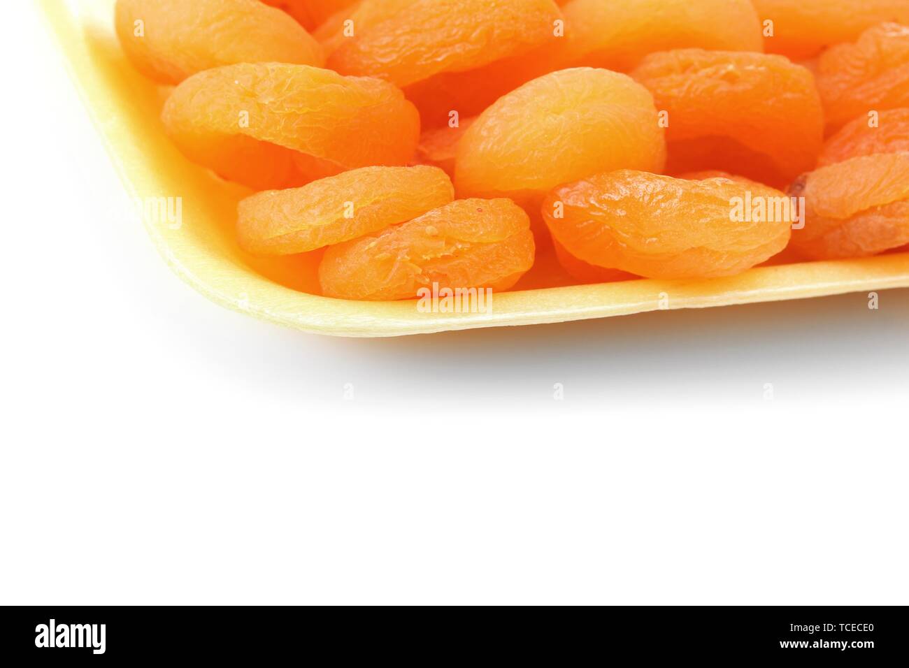 delicious dried apricots in packaging isolated on white Stock Photo - Alamy