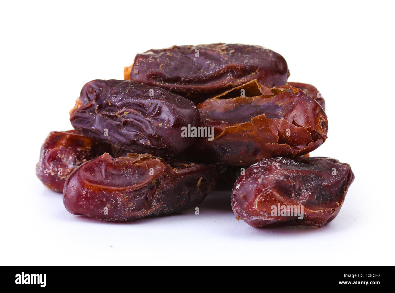 delicious dried dates isolated on white Stock Photo - Alamy