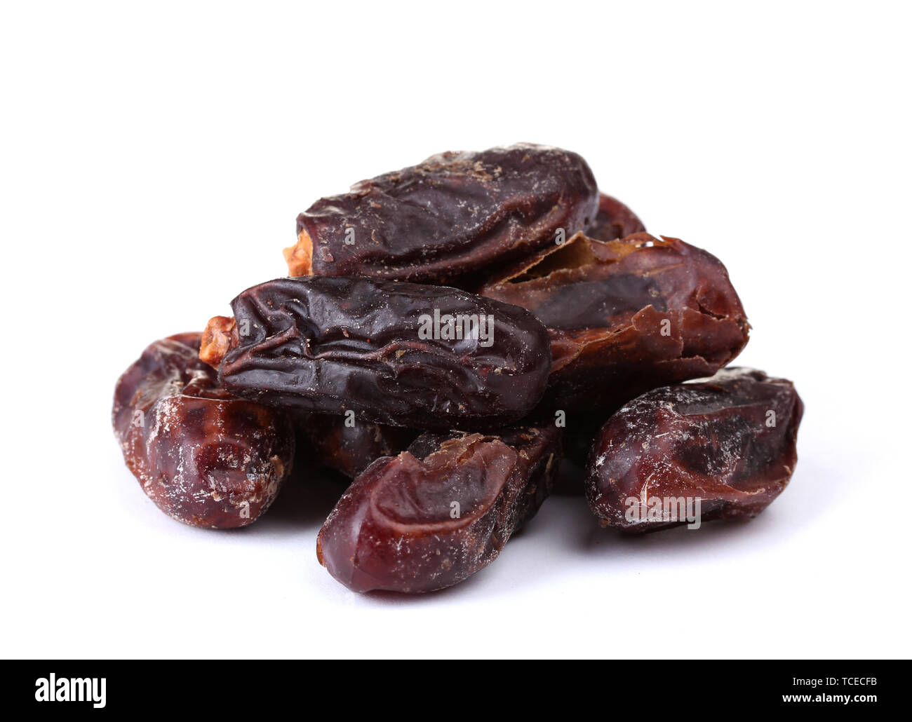 delicious dried dates isolated on white Stock Photo - Alamy