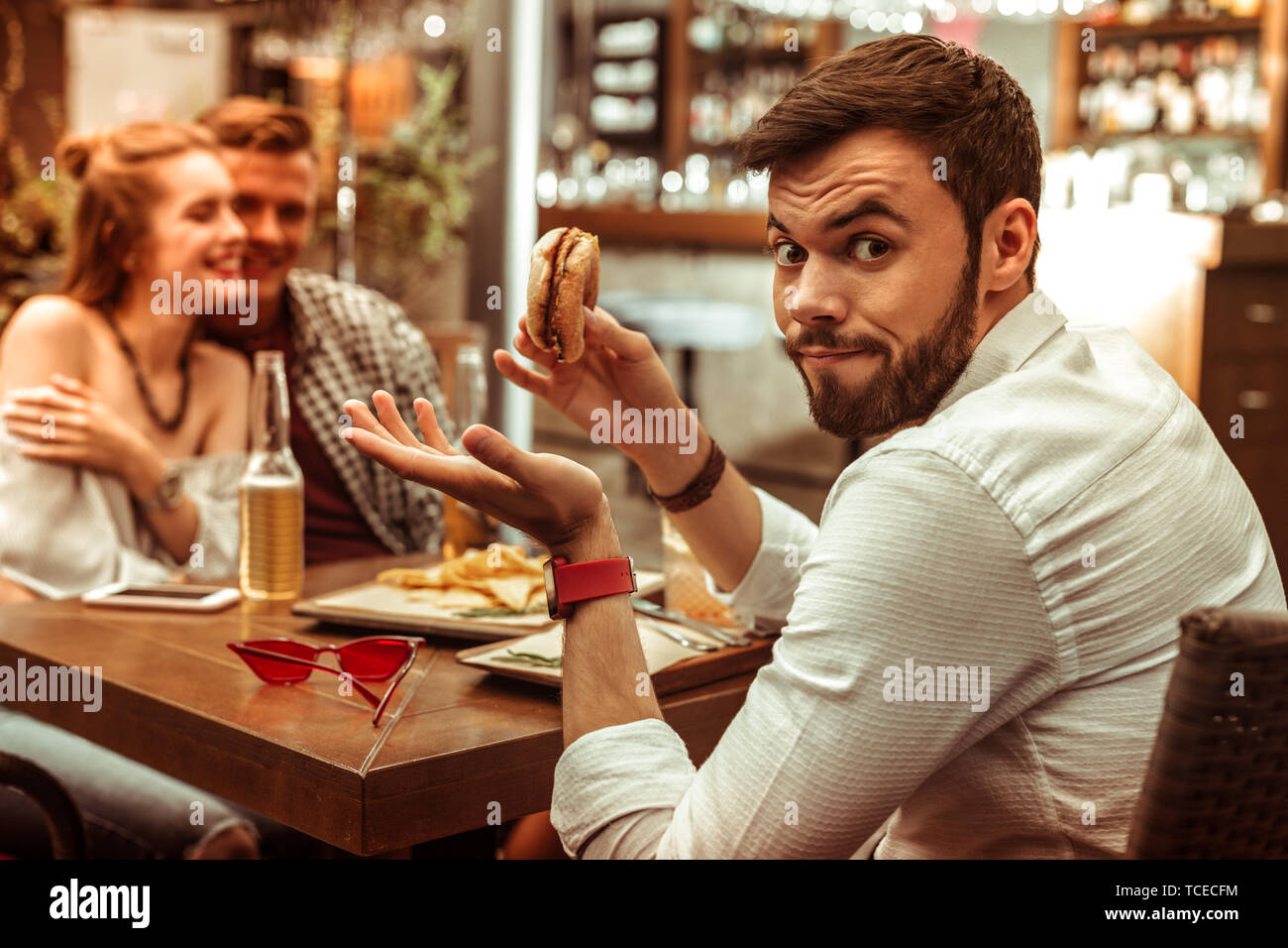 Woman man confused eating not children hi-res stock photography and ...