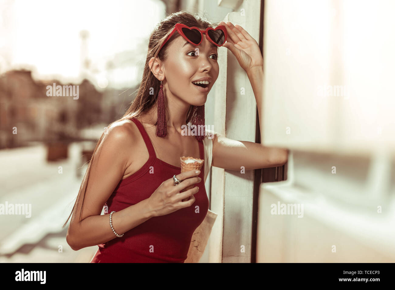 Bewitching amazed woman. Close-up portrait of beautiful alluring ...