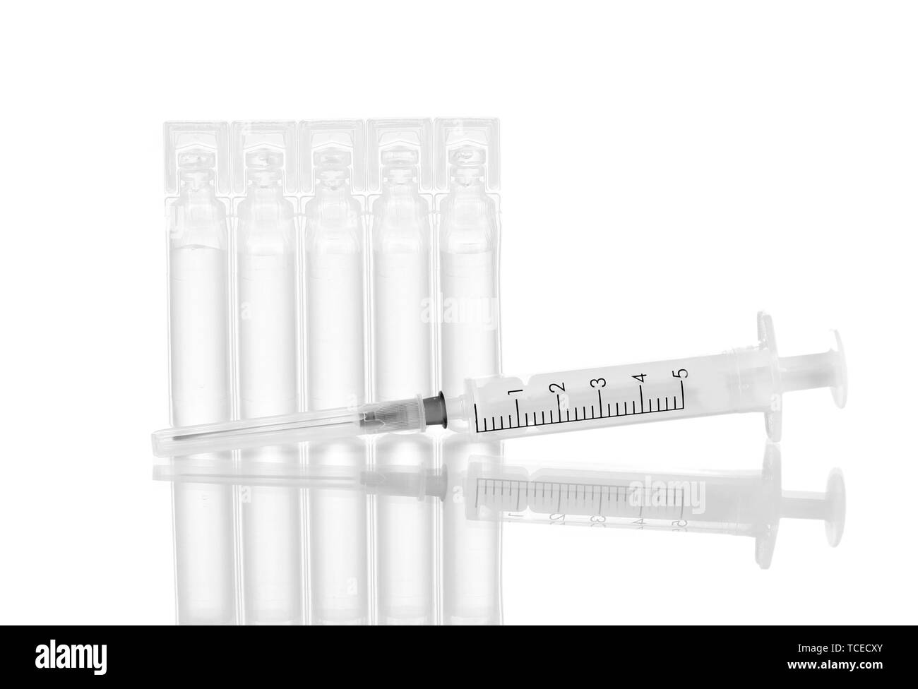 Medical vial syringe on white Black and White Stock Photos & Images - Alamy