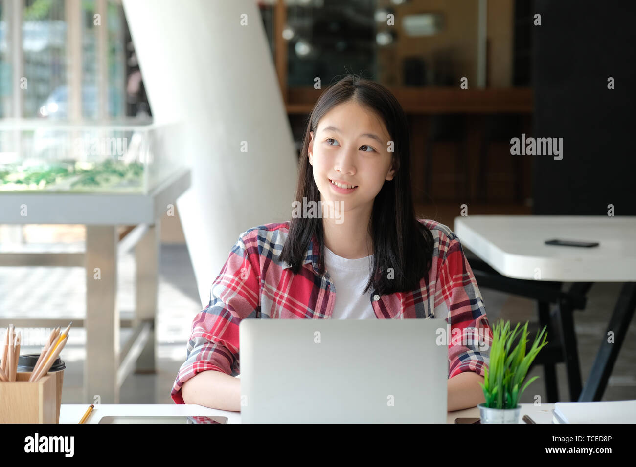 girl teenager college high school student studying with computer laptop ...