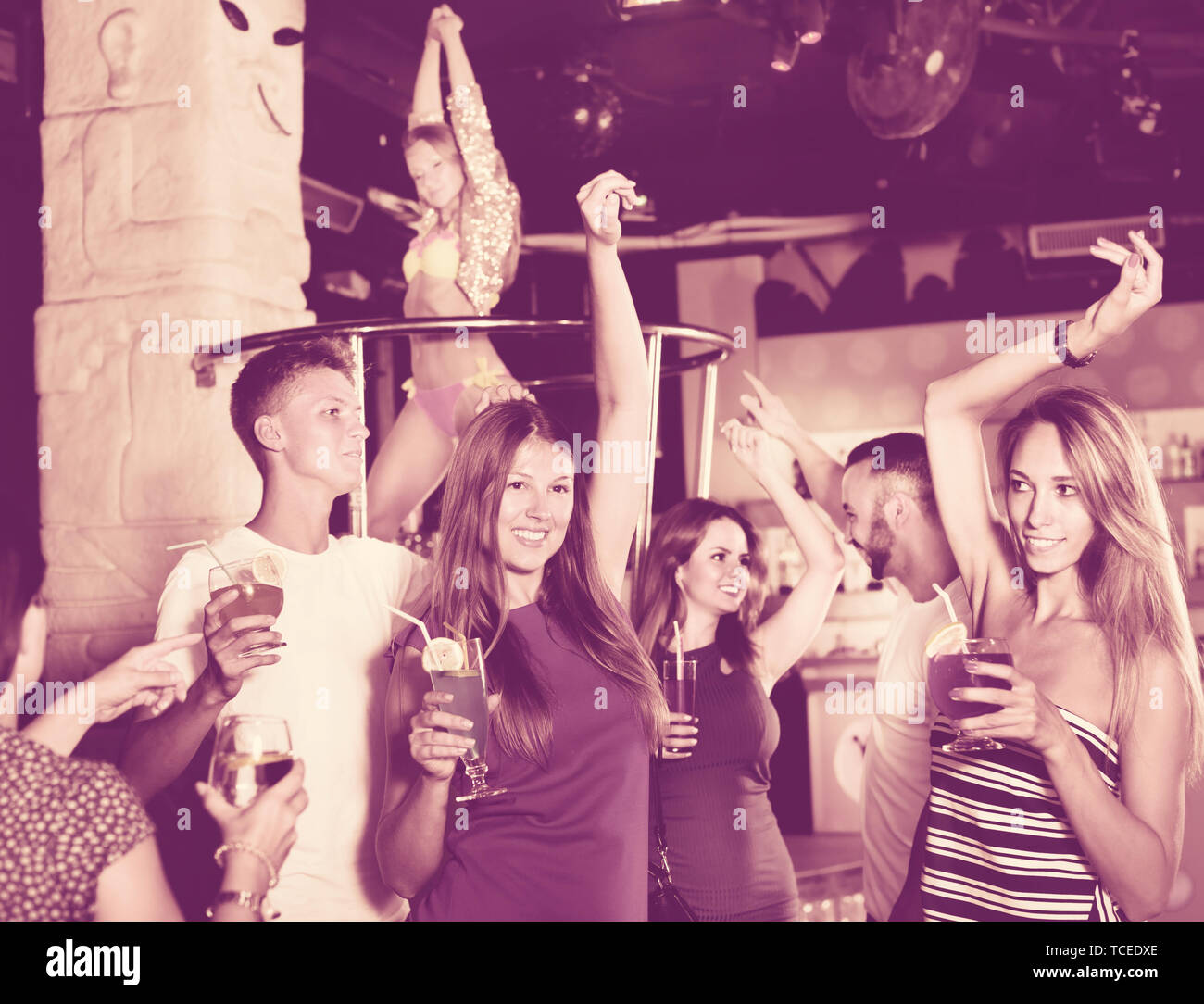 Young european people dancing in a club hi-res stock photography and ...