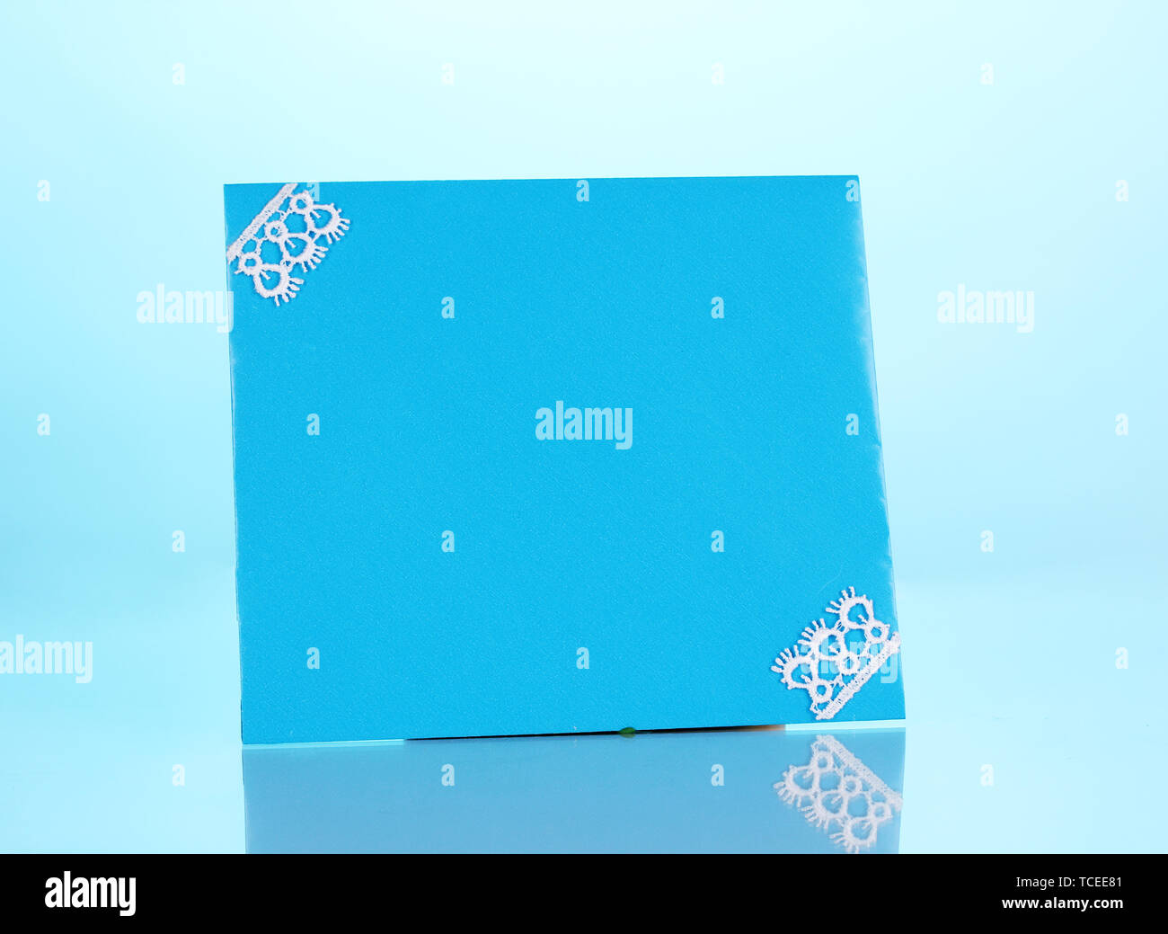 Color envelope on blue background Stock Photo - Alamy