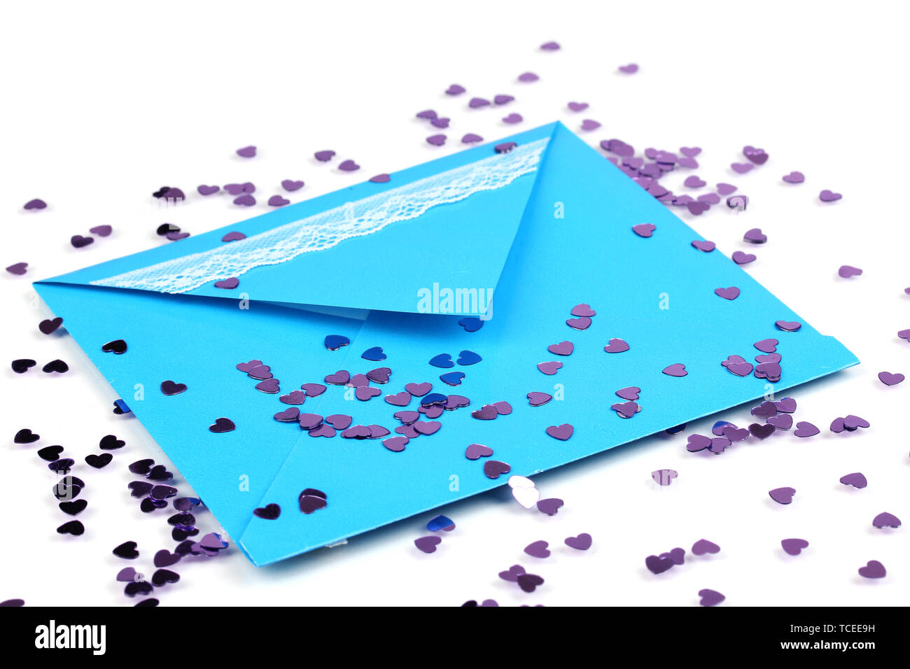 Color envelope and confetti isolated on white Stock Photo - Alamy