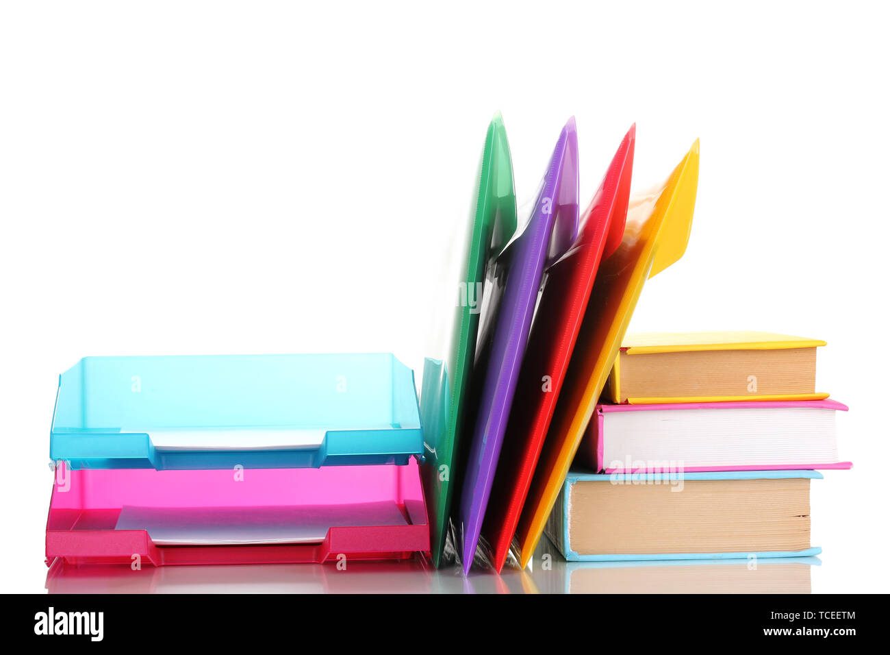 Bright office folders and books isolated on white Stock Photo - Alamy