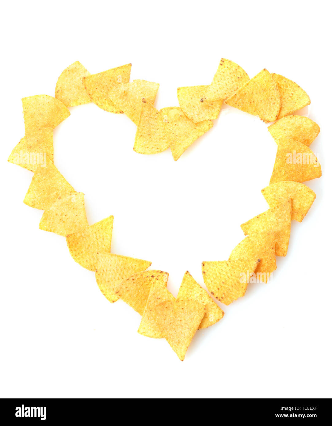 Delicious potato chips heart shape isolated on white Stock Photo - Alamy