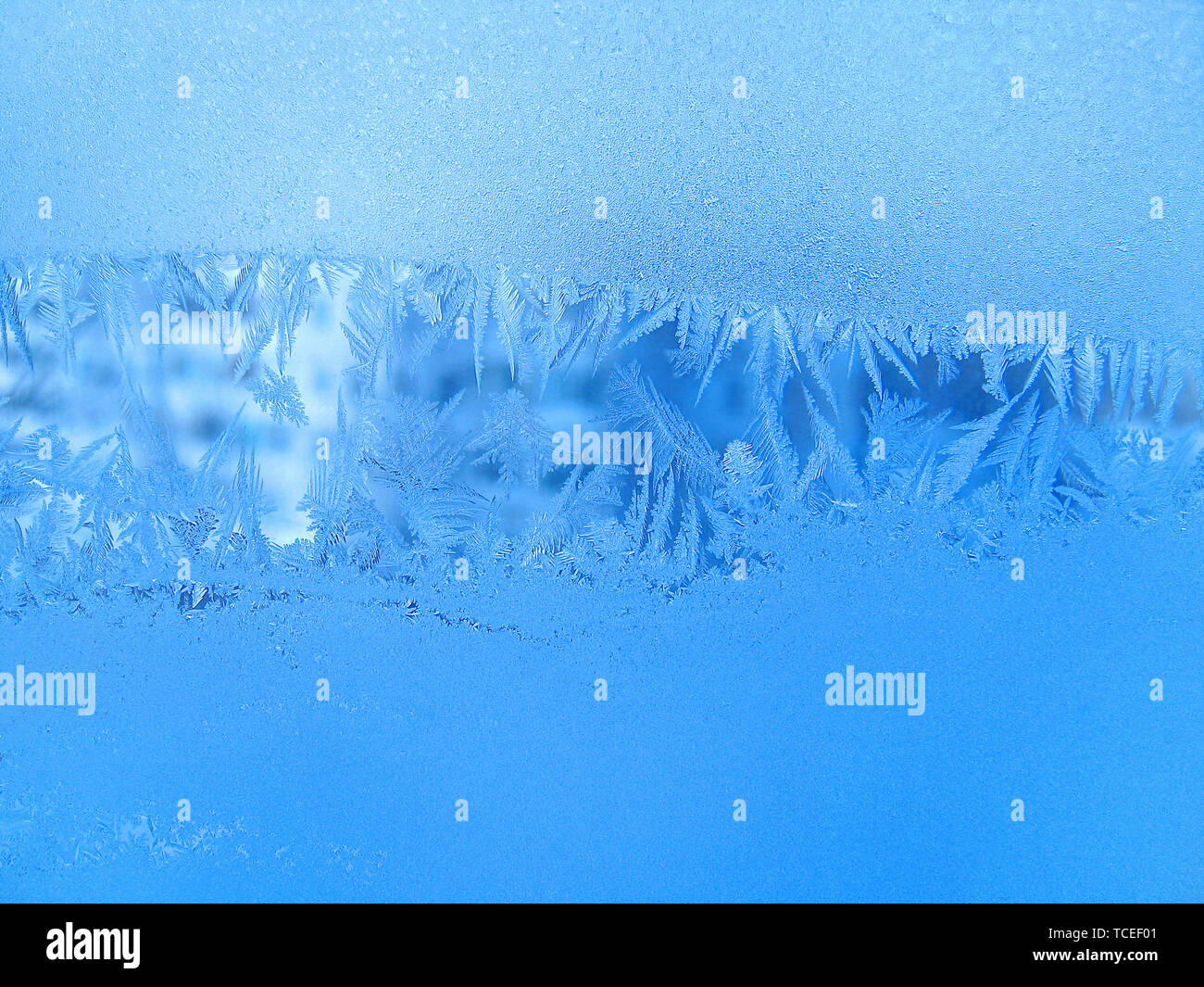 Natural ice pattern on winter window glass Stock Photo - Alamy