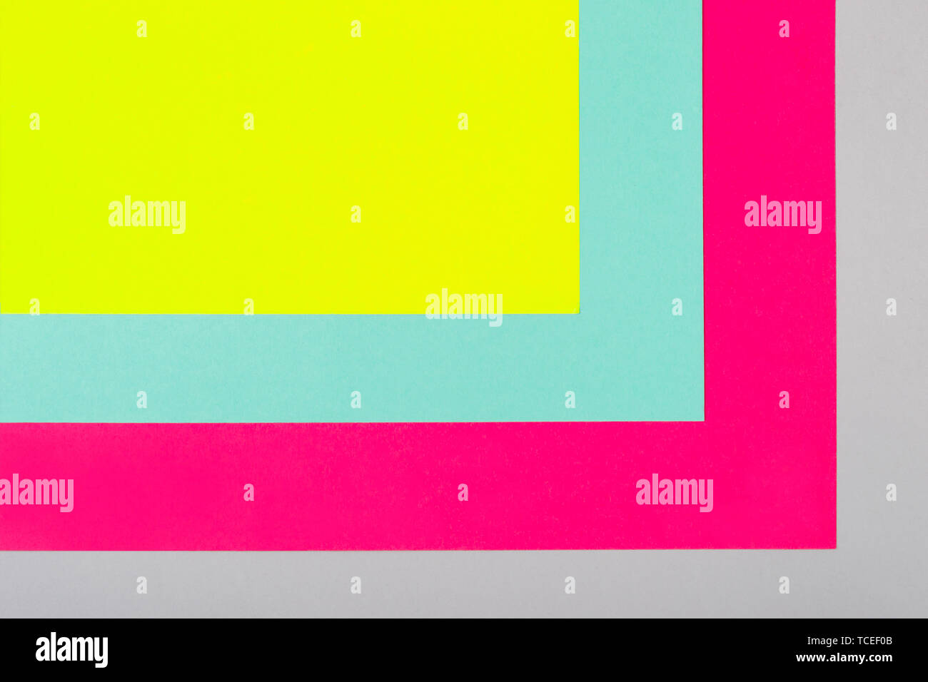 Abstract geometric background in bright neon colors. Glowing yellow ...