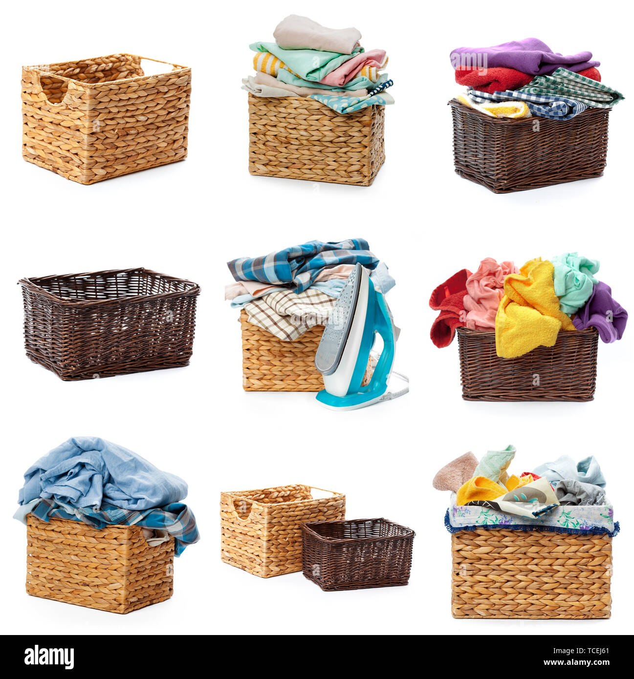 Clothes in a laundry wooden basket isolated on white background ...