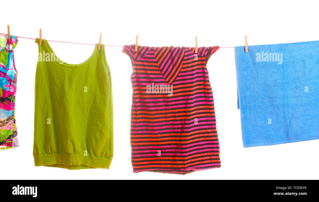 Clothes hanging on a rope isolated on white Stock Photo - Alamy