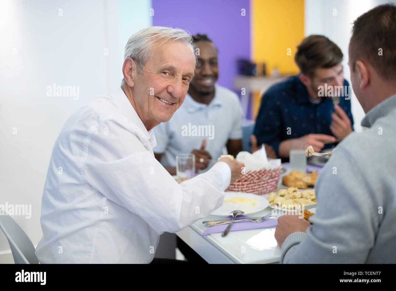 modern multiethnic muslim family enjoying eating iftar dinner together ...