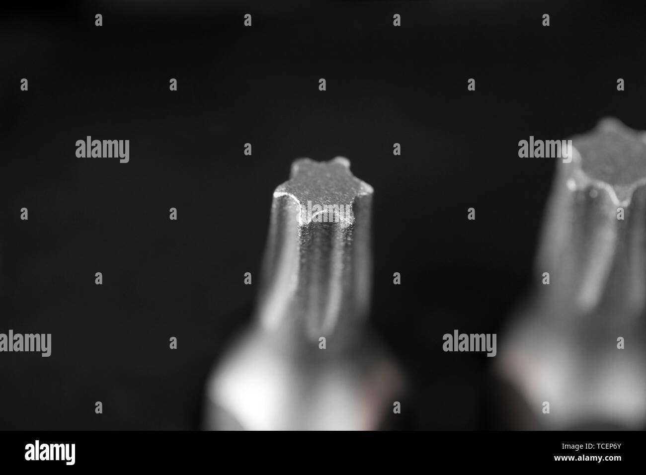 Construction bits on black closeup Stock Photo - Alamy