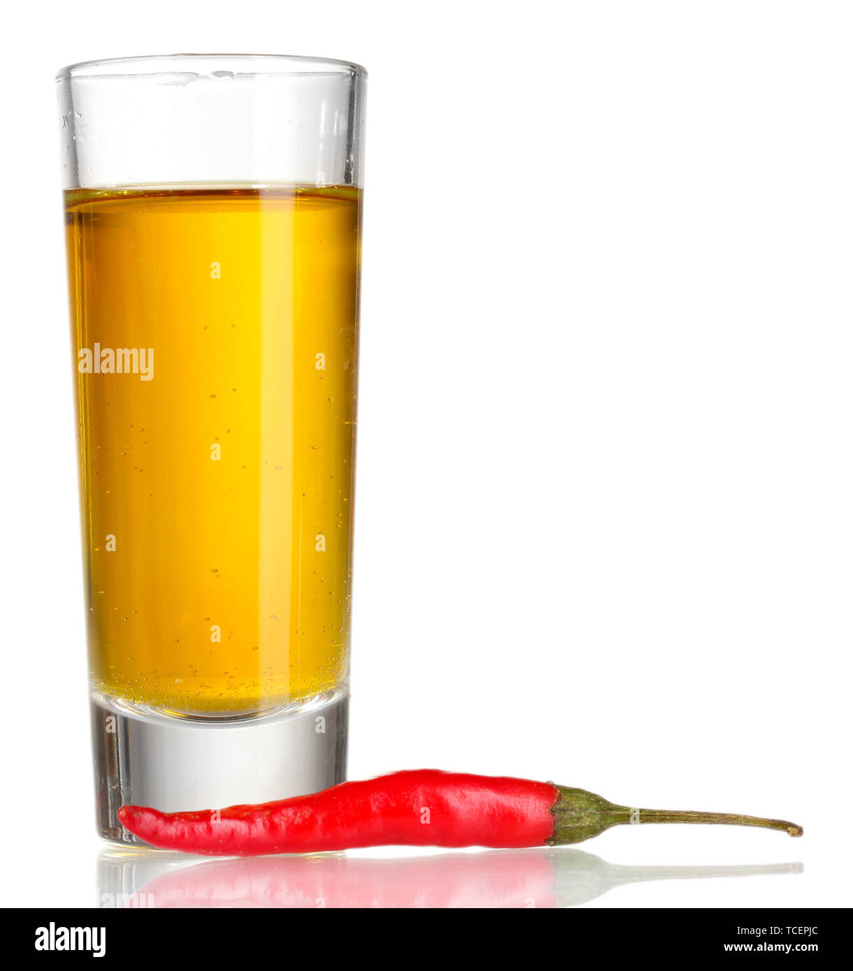 glass of pepper vodka and red chili pepper isolated on white Stock ...