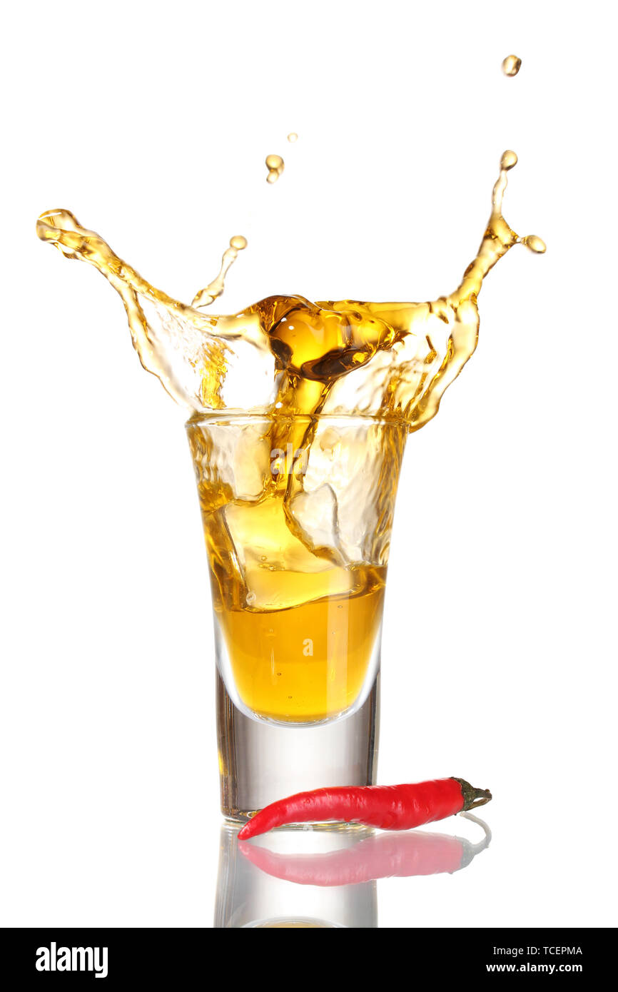 glass of pepper vodka and red chili pepper isolated on white Stock ...