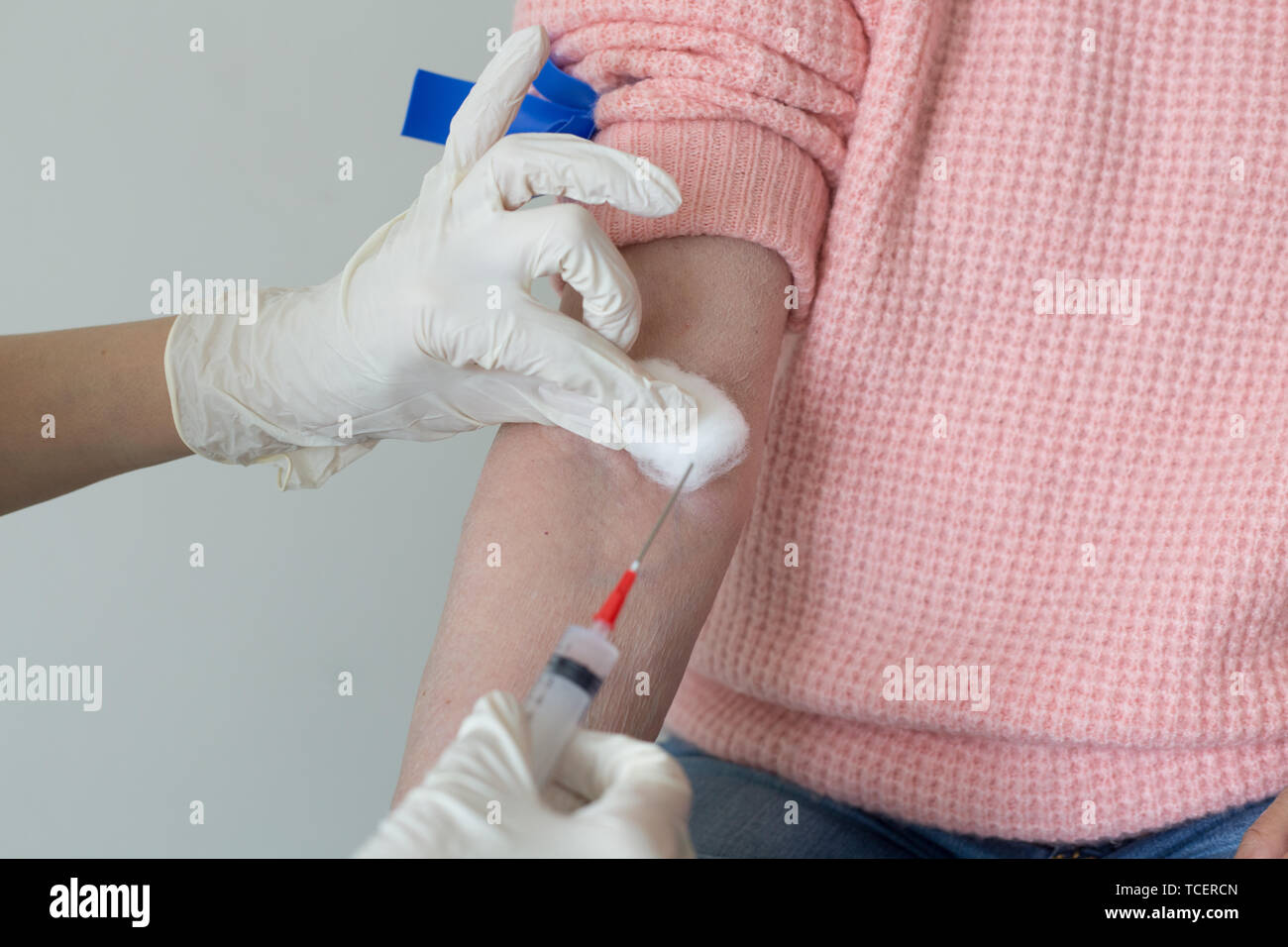Caregiver hands sterile medial gloves arm skin injection Stock Photo ...