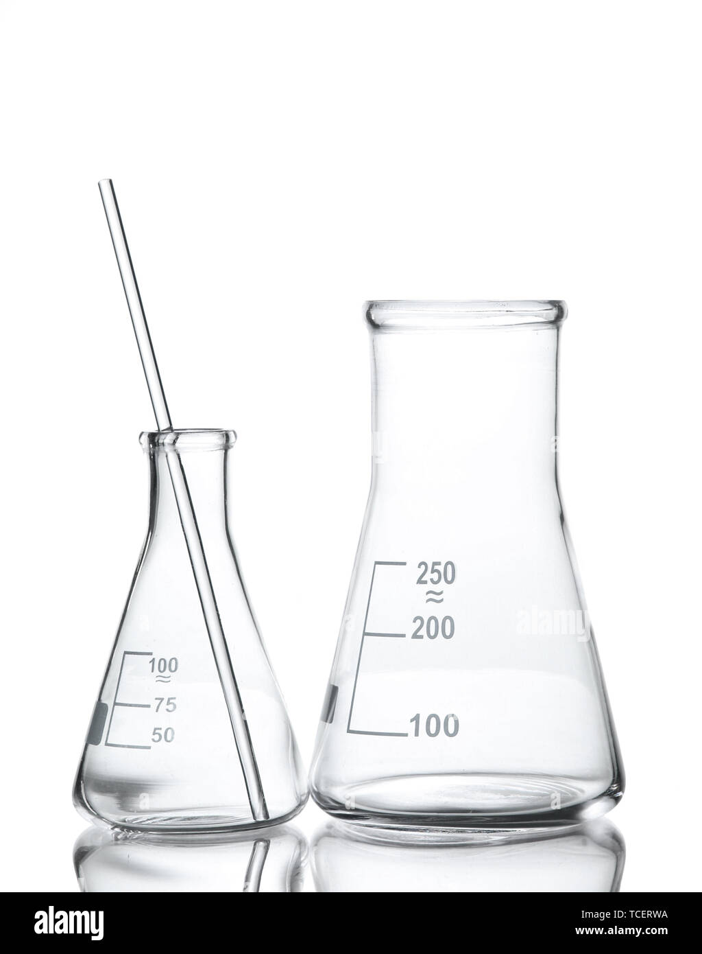 Two empty flasks with reflection isolated on white Stock Photo - Alamy