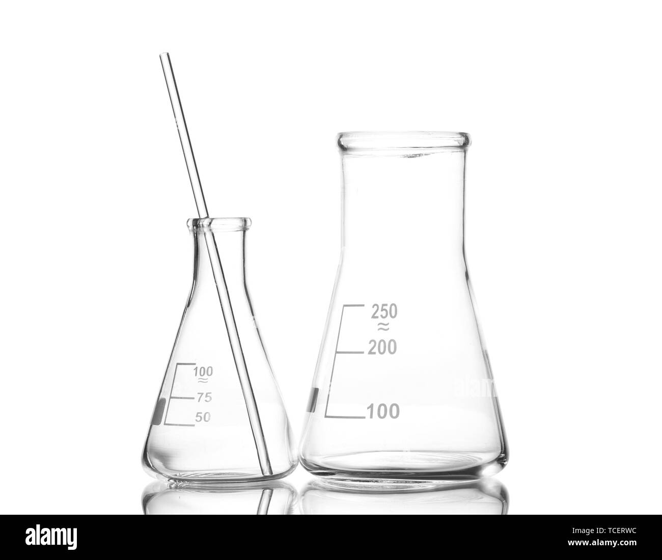 Two empty flasks with reflection isolated on white Stock Photo - Alamy