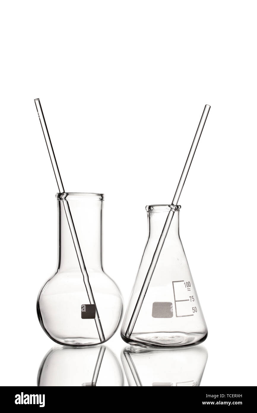 Two empty flasks with reflection isolated on white Stock Photo - Alamy