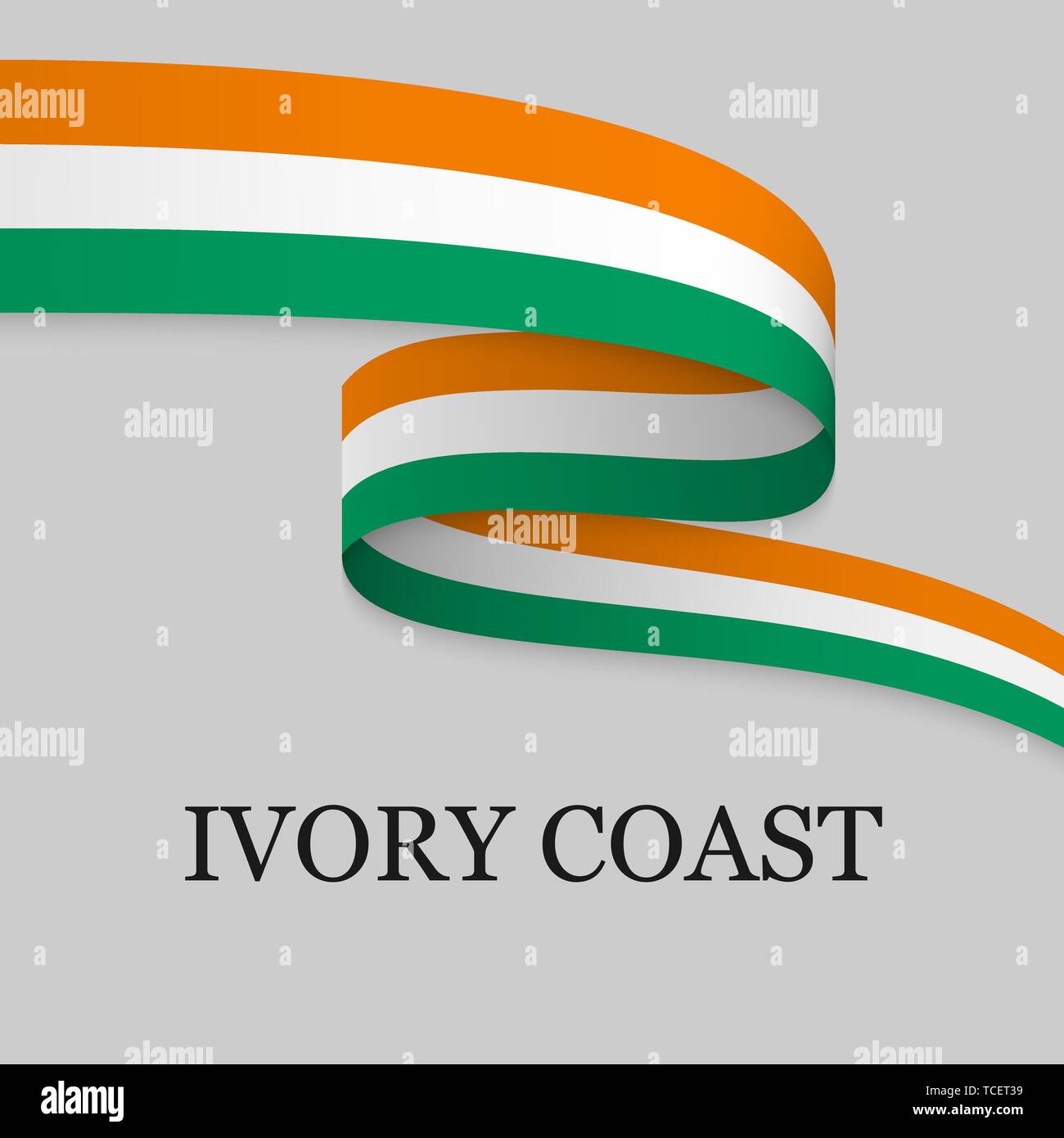 Waving ribbon or banner with flag of Ivory Coast. Template for ...