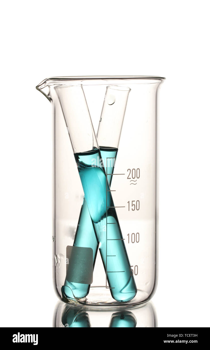Laboratory tubes with blue liquid in measuring beaker with reflection ...