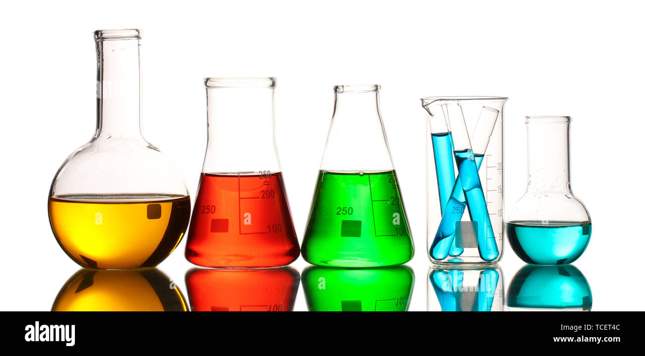 Different laboratory glassware with color liquid and with reflection ...