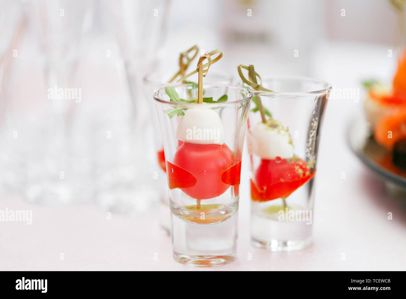 Appetizer, Caprese. Cherry tomatoes,mozzarella and Basil on skewers ...